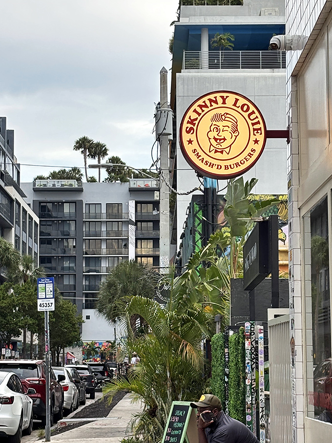 That circular sign with its cheeky character is like a wink to those in-the-know about Miami's burger scene.