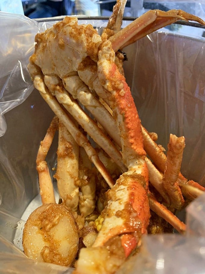 Snow crab legs bathed in seasoned glory&mdash;nature's perfect design for making you work just enough to appreciate each sweet morsel.