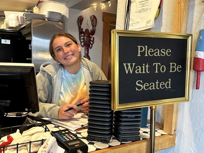 The warm smile at the host stand promises the kind of genuine hospitality that keeps folks coming back year after year.