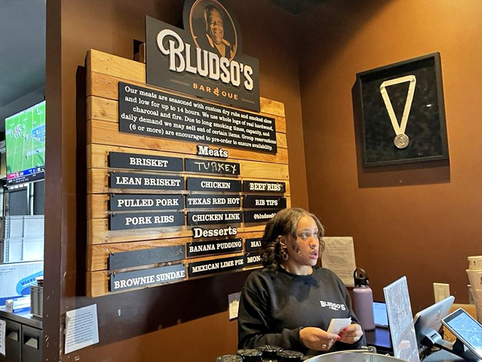The staff at Bludso's aren't just servers; they're barbecue ambassadors guiding you through a menu of smoky delights.