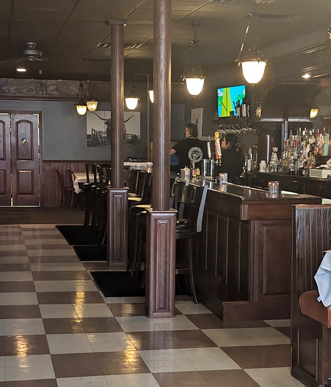 From this angle, you can almost hear the gentle buzz of conversation and the satisfying clink of glassware that forms the soundtrack of a great steakhouse.