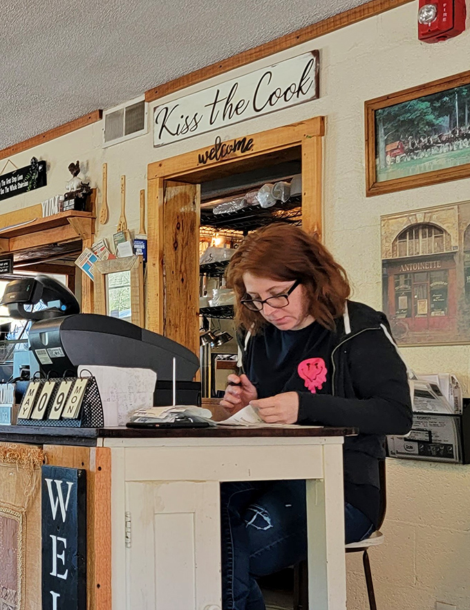 Behind every great restaurant is someone who makes the magic happen. The "Kiss the Cook" sign isn't just cute&mdash;it's solid advice.