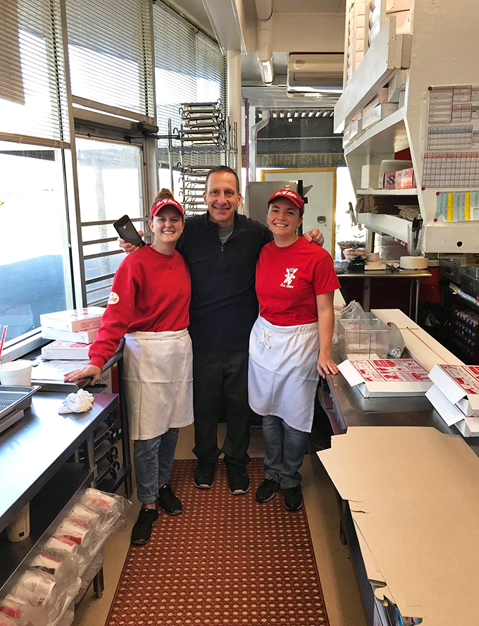 The heart of any great restaurant is its people—Red Rabbit's friendly staff keeps the legacy alive with every order.