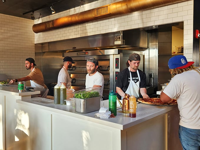 Behind every perfect pizza is a team of focused professionals who treat dough with the reverence usually reserved for fine art or vintage vinyl.