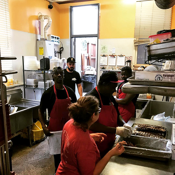 Behind the scenes, the kitchen crew orchestrates the smoke and fire with practiced precision&mdash;barbecue may be slow food, but these folks know exactly what they're doing.