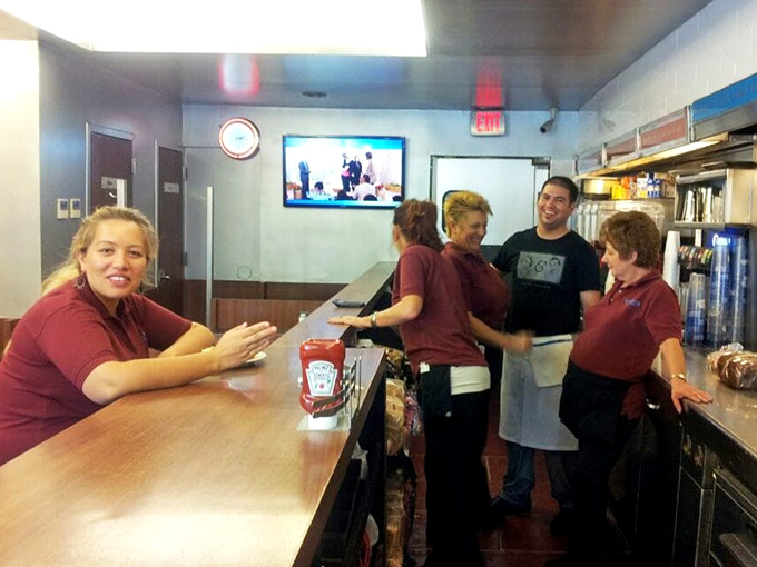 The counter experience&mdash;where solo diners become temporary family and servers remember your order before you've fully settled onto your stool.