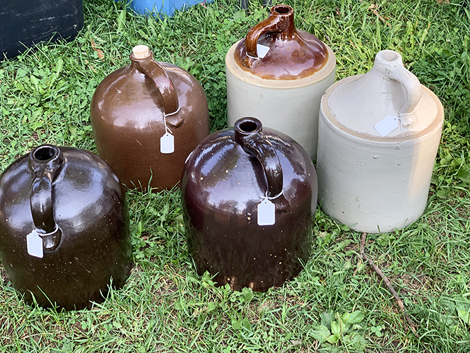 Stoneware jugs that have seen things. Once filled with everything from whiskey to maple syrup, they now stand ready for their Pinterest-worthy afterlife.