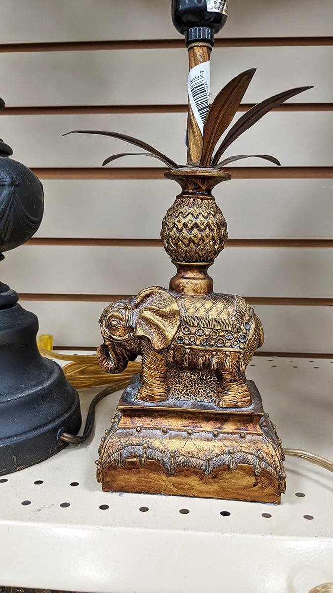 This golden elephant pineapple lamp isn't just illumination—it's a statement piece that screams "I vacation in places with excellent gift shops."