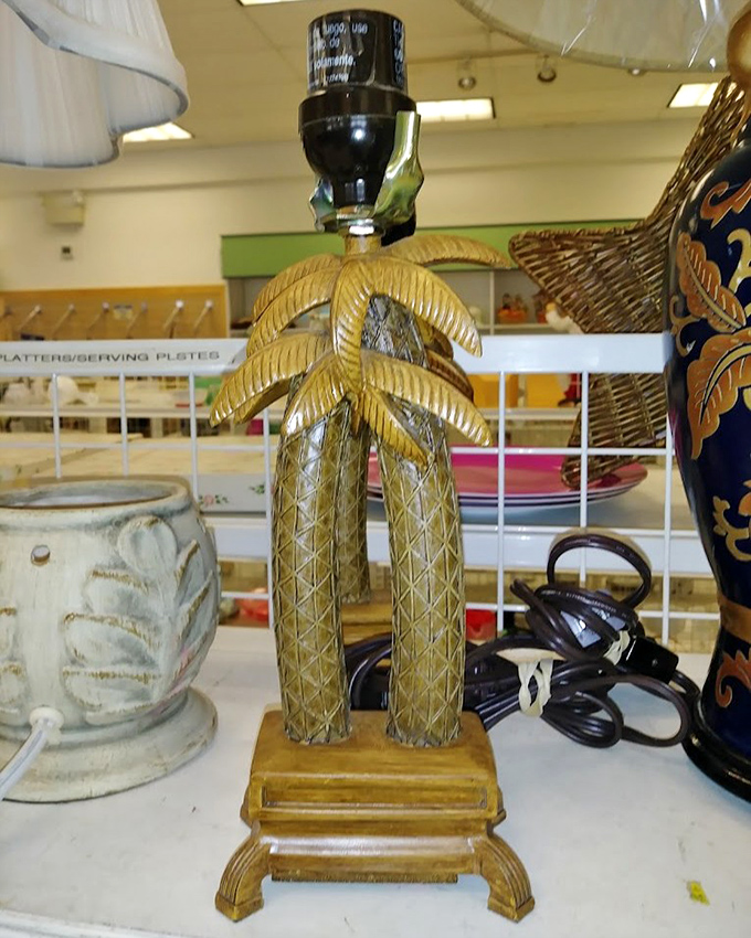 This brass palm tree lamp screams "vacation vibes" for your living room. Instant tropical getaway without the airfare or sunburn!