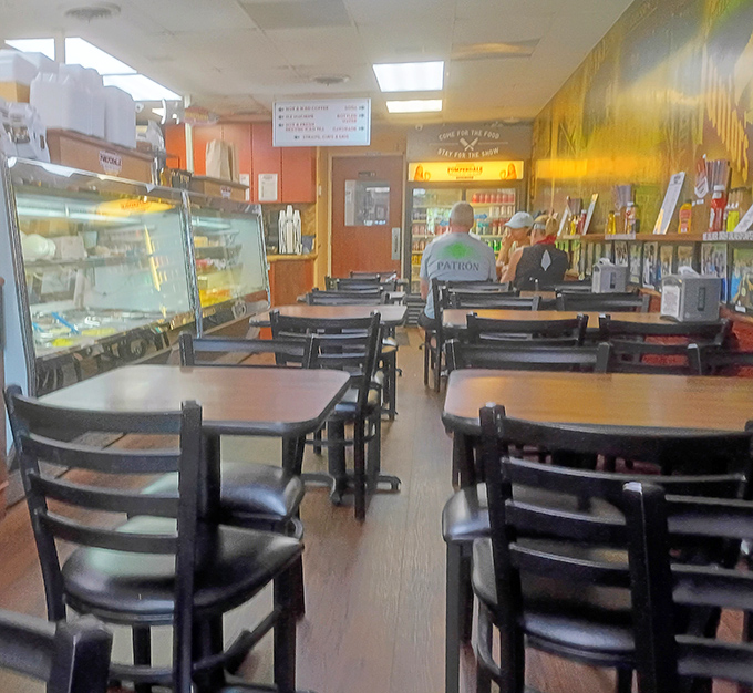 Simple tables where the real magic happens: watching people attempt to fit these sandwiches into their mouths successfully.