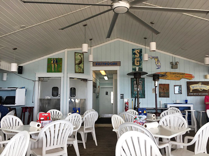 The dining room's coastal simplicity lets the food and atmosphere shine&mdash;no pretension, just good eating and island vibes.