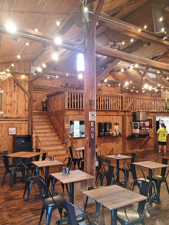 Tables waiting for the drama of great meals to unfold. Those string lights aren't just illumination—they're the stars witnessing your BBQ epiphanies.