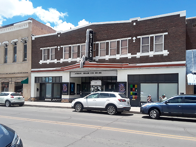 The old theater stands ready for its next act, vintage marquee promising entertainment that doesn't require streaming subscriptions.