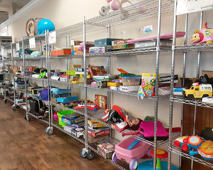 Childhood nostalgia by the shelf-full. That pink toy car is practically begging for a test drive down memory lane.