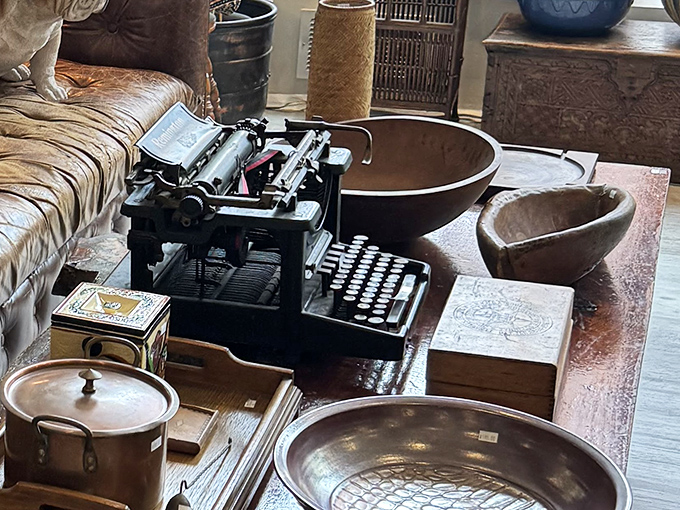 Analog dreams come alive with this vintage typewriter display&mdash;surrounded by brass bowls and wooden boxes from simpler times.