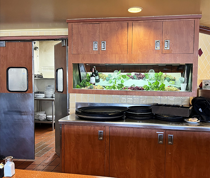Behind the scenes glimpse of Keno's salad station, where fresh ingredients await their moment of glory on your plate.