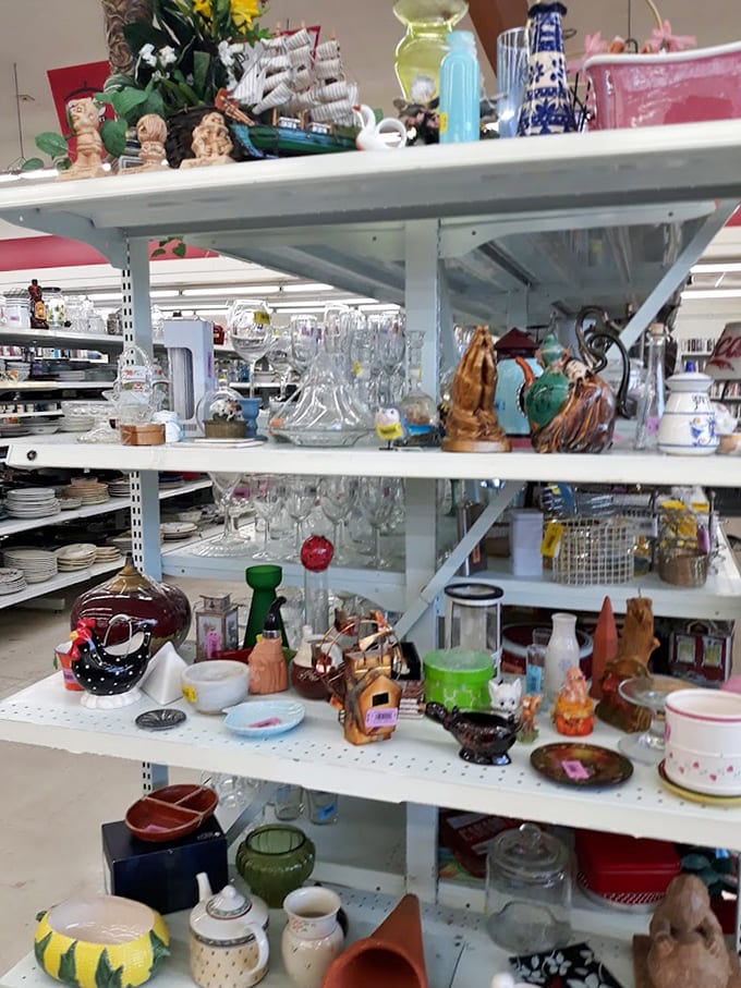 Glassware and figurines create a miniature cityscape of fragile treasures – one person's kitsch is another's priceless collection.