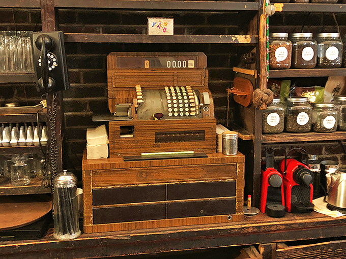 That vintage National Cash Register has probably rung up more ribeyes than a Texas cattle ranch has cows.