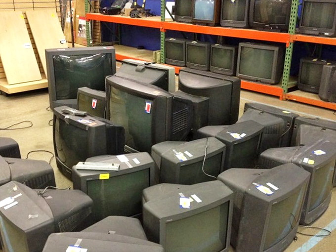 A graveyard of vintage televisions waits for collectors or set designers—these aren't flat screens, but they're definitely conversation starters.