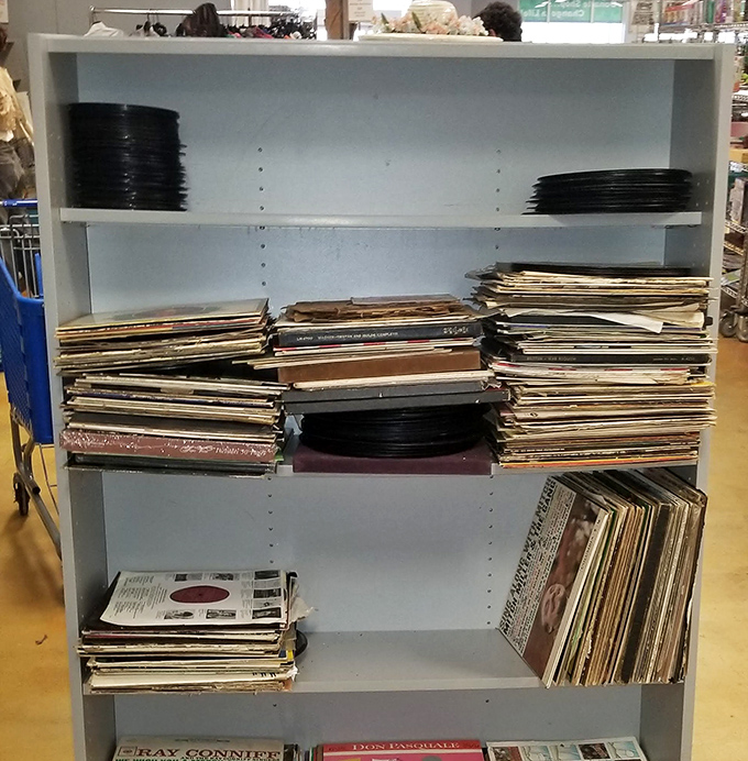 Vinyl records stacked like pancakes at a diner&mdash;each one a portal to another era. Musical treasures waiting for their needle-drop moment.