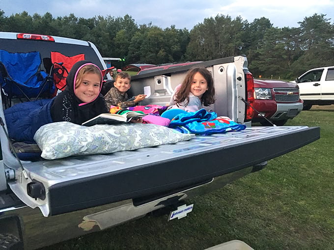 Kids nestled in truck beds with blankets and pillows&mdash;the original luxury box seats of outdoor cinema.