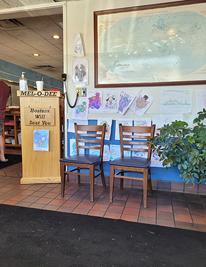 The waiting area wall &ndash; where children's artwork and world maps remind you that good food transcends boundaries.