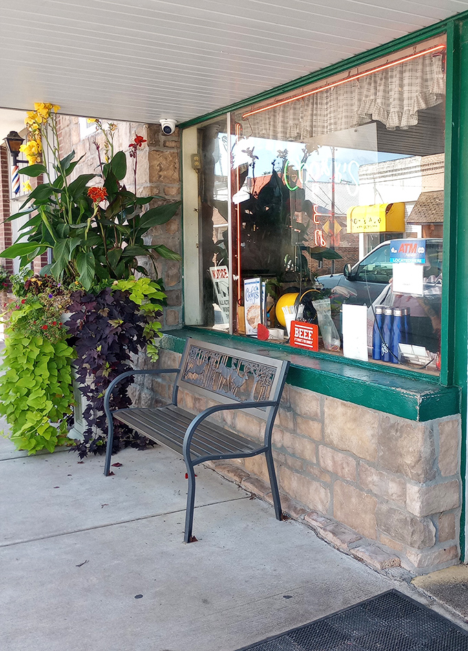 A welcoming storefront complete with flowers that says "come on in" without needing fancy marketing consultants.