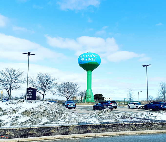 Winter can't stop Wisconsin shoppers &ndash; the Pleasant Prairie water tower stands tall against the snow, guiding bargain hunters home.