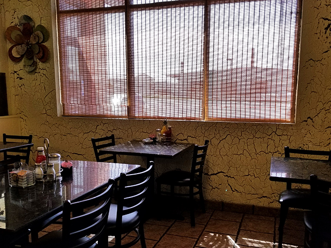 Window seats offer natural light for your meal and perfect people-watching opportunities between bites of delicious comfort food.