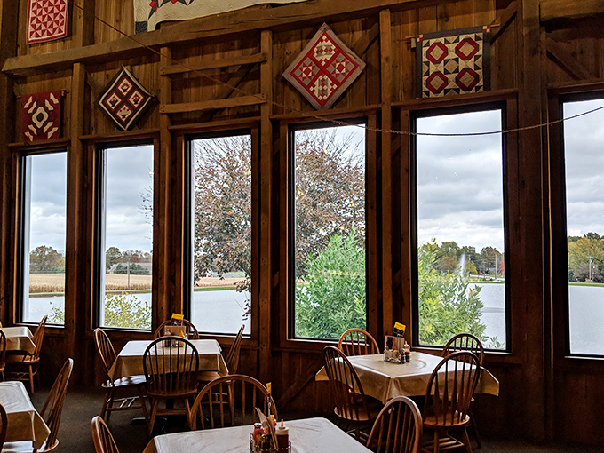 Sunlight streams through windows framed by handcrafted quilts, turning an ordinary lunch into a quintessential Ohio country experience.