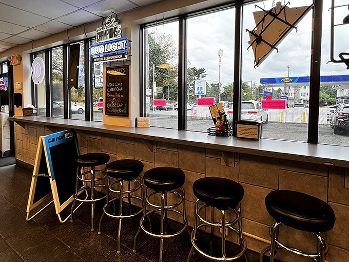 Window seats offer prime people-watching real estate while you contemplate the profound relationship between bread, meat, and cheese.