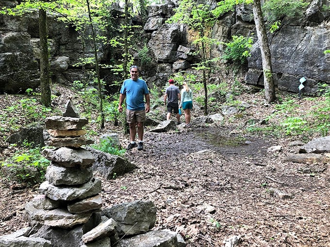 The best discoveries are often shared ones. These hikers found the sweet spot where conversation meets contemplation among towering rock walls.