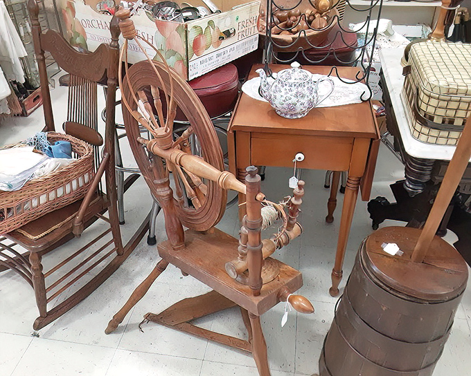 A spinning wheel that once created yarn for pioneer garments now waits to become the conversation piece in someone's craftsman living room.