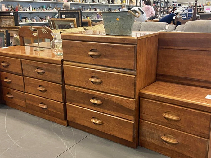 Solid wood dressers standing at attention like soldiers of storage. These aren't particle board pretenders&mdash;they're the real deal, ready for decades more service.