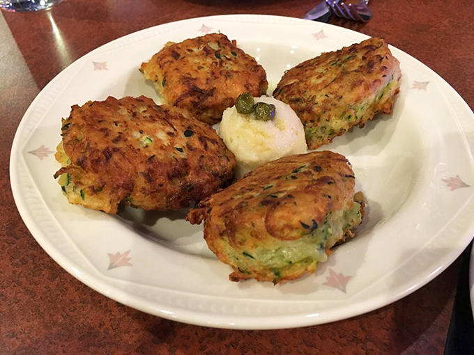 Zucchini fritters that achieve the impossible: making vegetables the thing everyone fights over at the table.