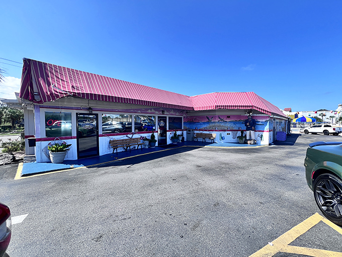 This cheerful red-roofed building promises buffet abundance where Calabash-style seafood dreams come gloriously true.