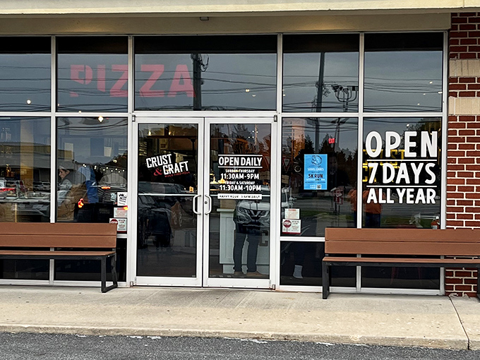 Modern glass and steel promising contemporary pizza innovation - where tradition meets creative culinary evolution.