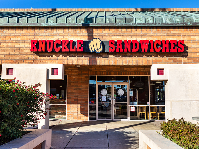 That bold red lettering and fist logo promise sandwiches with personality, strength, and flavors that pack a serious punch.