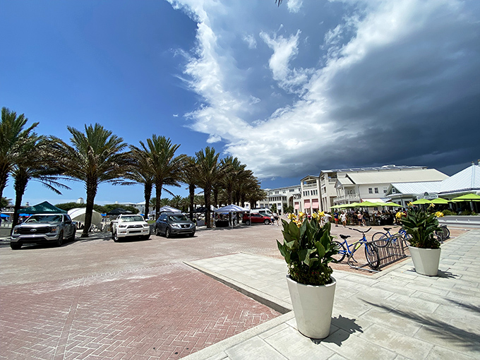Seaside's town center buzzes with activity where palm trees and pristine planning create the ultimate family-friendly beach destination.
