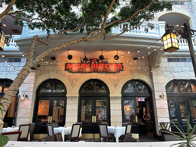 String lights and bold signage create an inviting atmosphere where serious steaks meet casual good times.