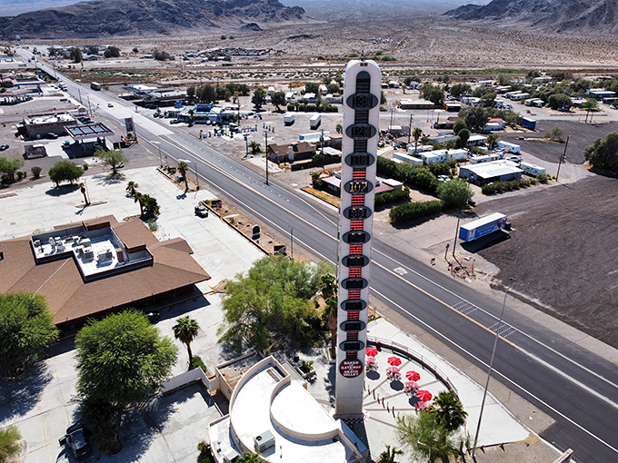 The World's Largest Thermometer towers over Baker, California, marking the gateway to Death Valley's extreme heat.