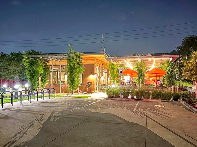 Evening lights transform King Dough's patio into an urban oasis where pizza dreams come true under Indiana skies.