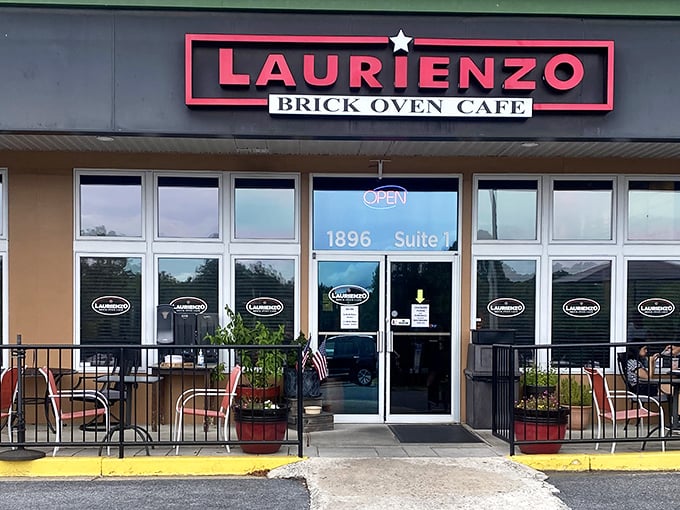 The neat row of umbrellas outside Laurienzo stands ready for those who prefer their pizza with fresh air.
