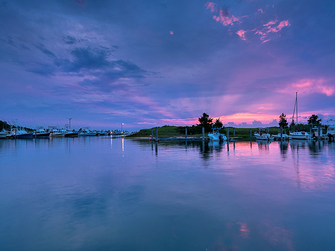 When twilight paints the harbor purple, even the boats seem to pause in reverence.