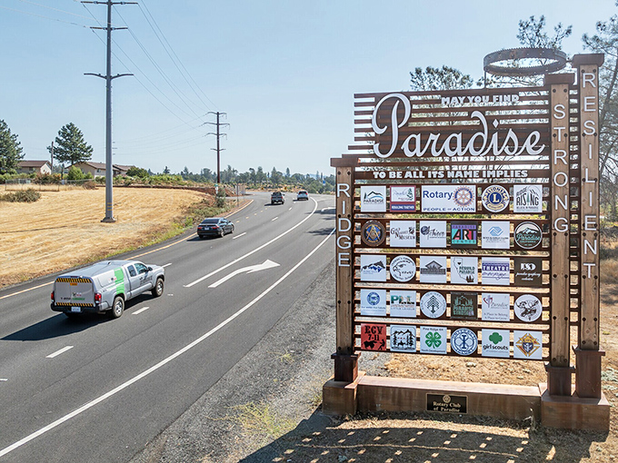 Paradise welcomes visitors with a sign showcasing community pride and resilience. A town rebuilding with hope and determination.