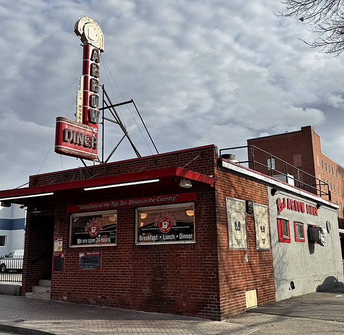 That vintage neon sign isn't just advertising—it's a piece of New Hampshire history that happens to point toward incredible home fries.