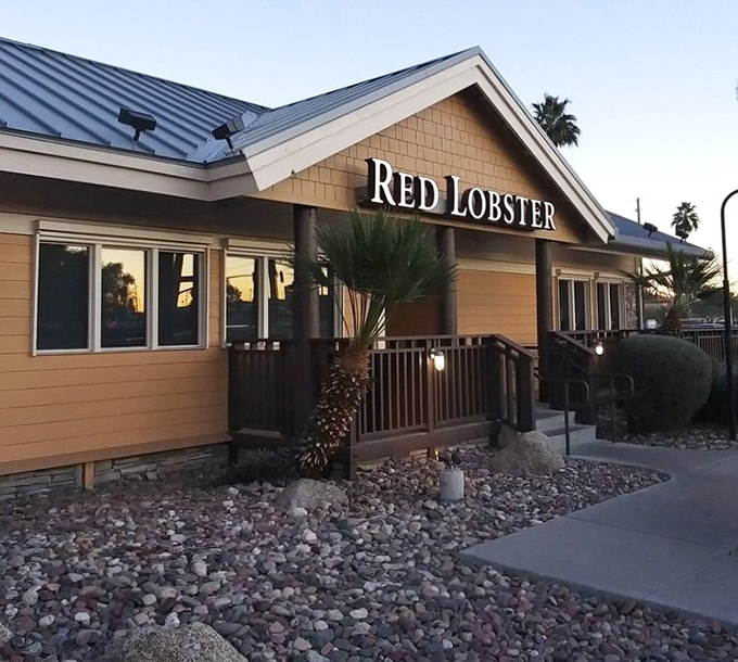 As the sun sets, Red Lobster's inviting facade promises comfort food from the sea in a family-friendly setting.