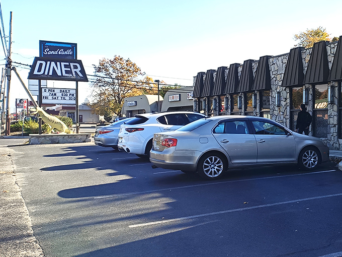 The classic diner lineup of satisfied customers' cars tells the real story of consistently excellent food.