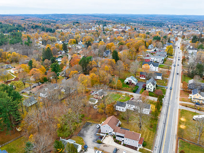 Autumn's paintbrush transforms Spencer's landscape, where affordable homes line streets as inviting as the colorful canopy above.