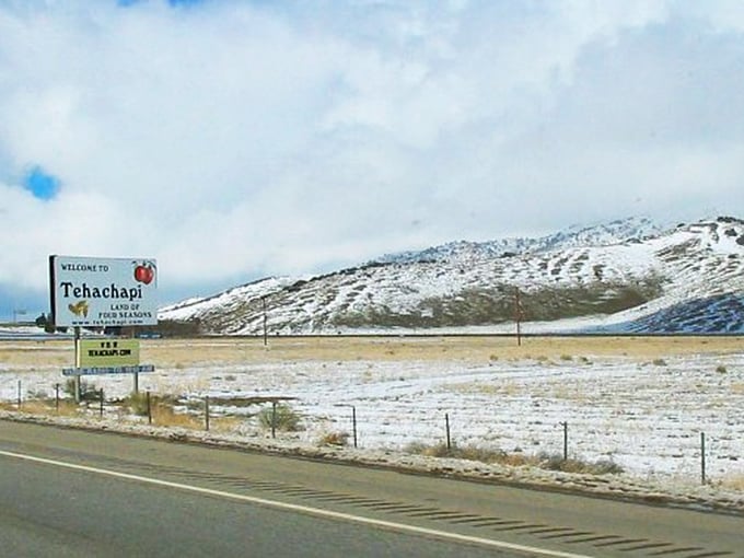 Tehachapi's welcome sign hints at the affordable mountain paradise beyond, where your Social Security check stretches as far as the views. 